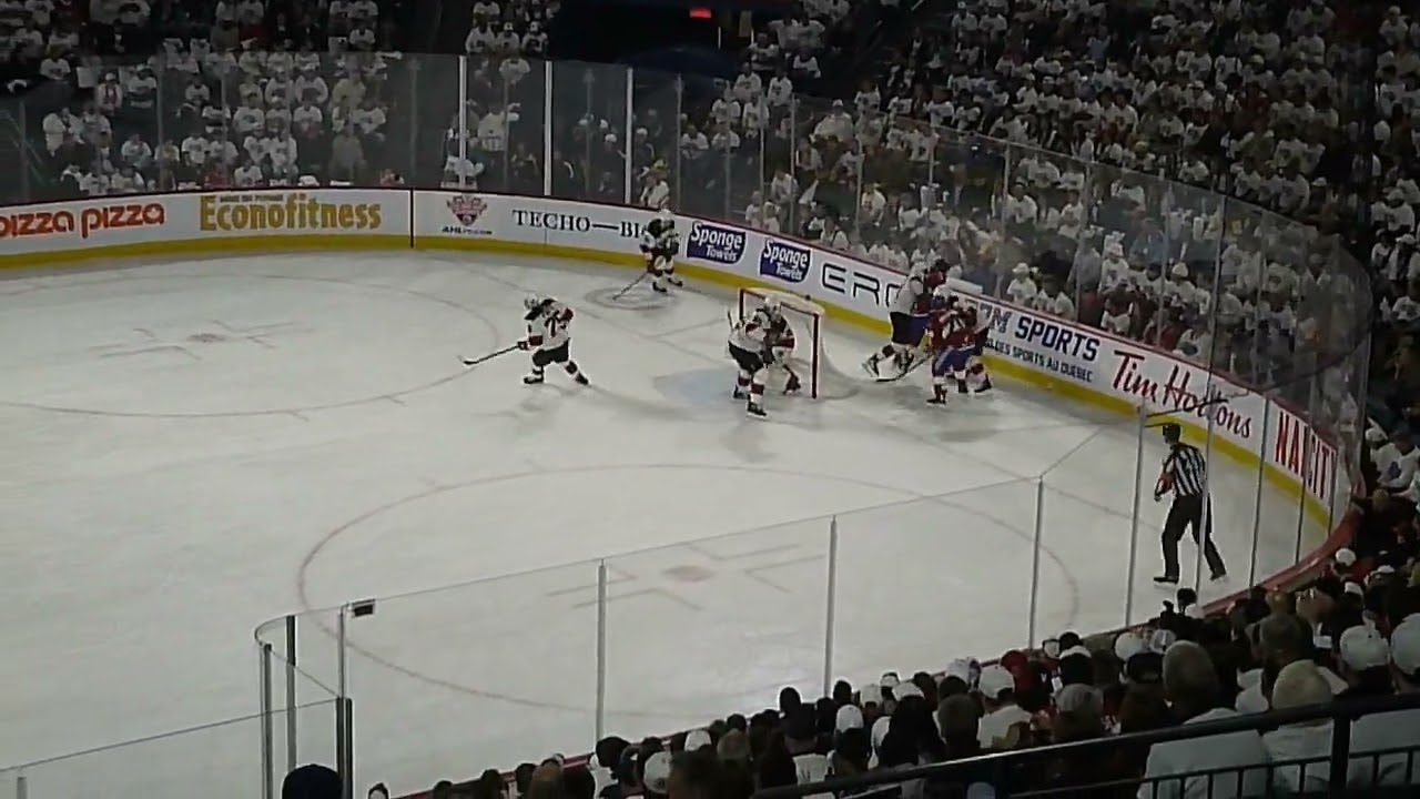 Utica Comets' Nico Daws stops Laval Rocket's Lucas Condotta on a ...